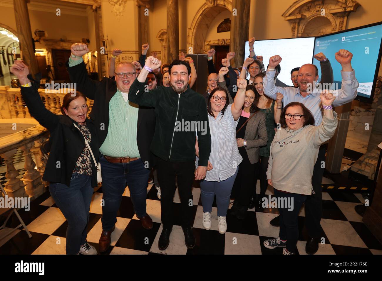 Paul Doherty (centre) from the SDLP who won a seat in Blackmountain at ...
