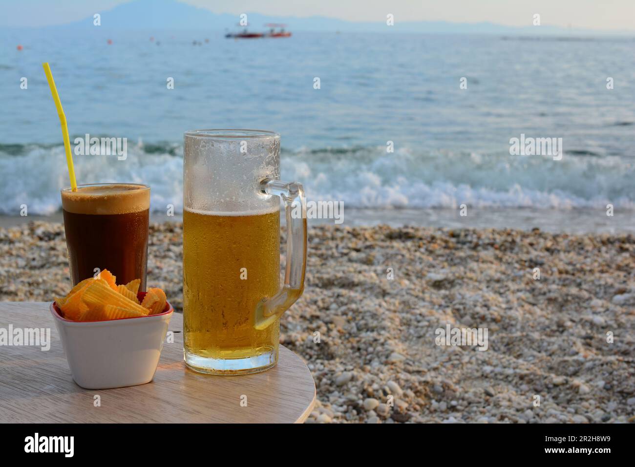 Snack and drink by the sea, cold coffee frappe, ice cold beer and ...