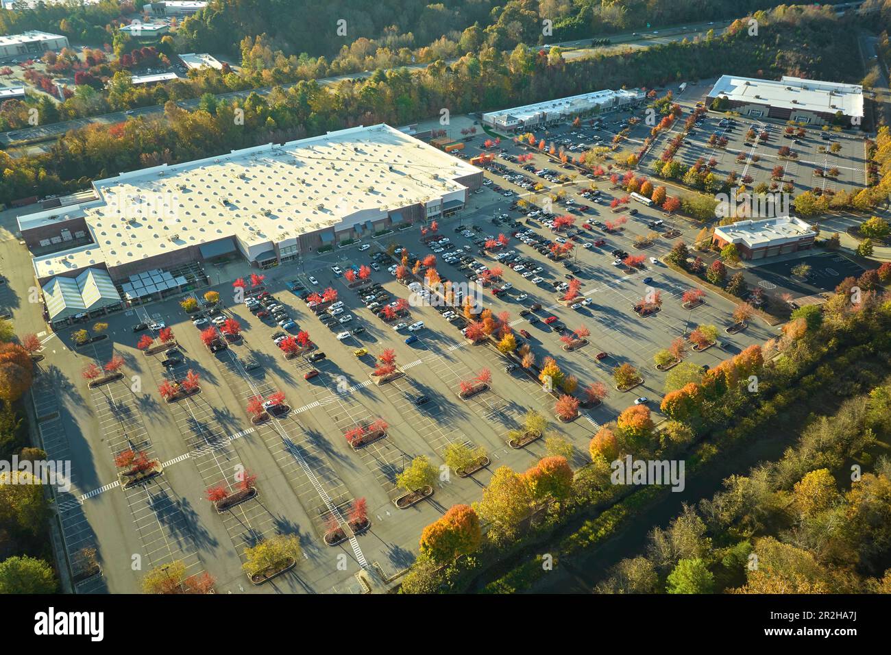 View from above of american grocery store with many parked cars on ...
