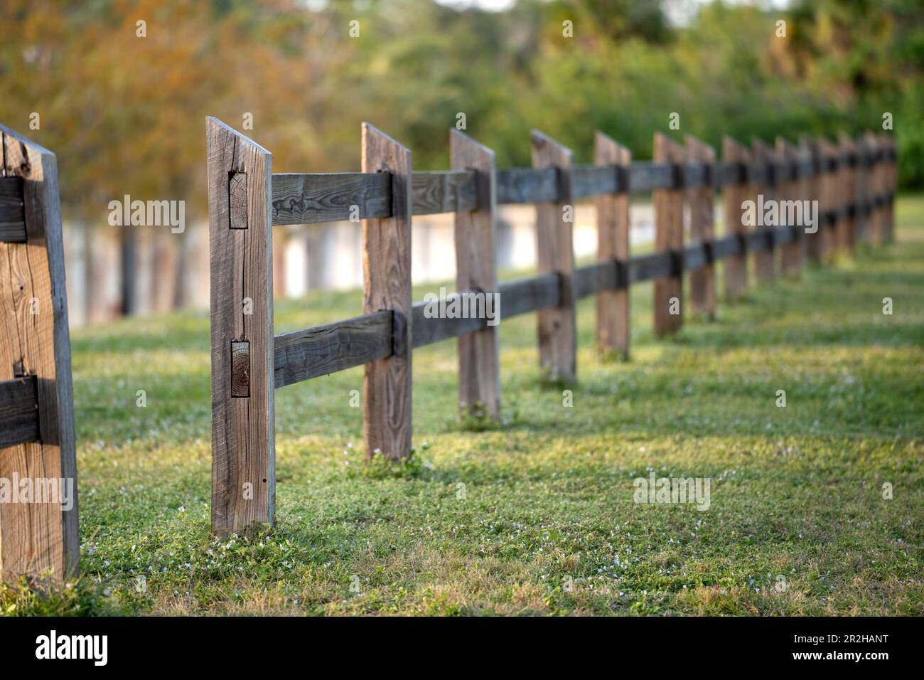 Wooden fence barrier at farm grounds for cattle and territory ...