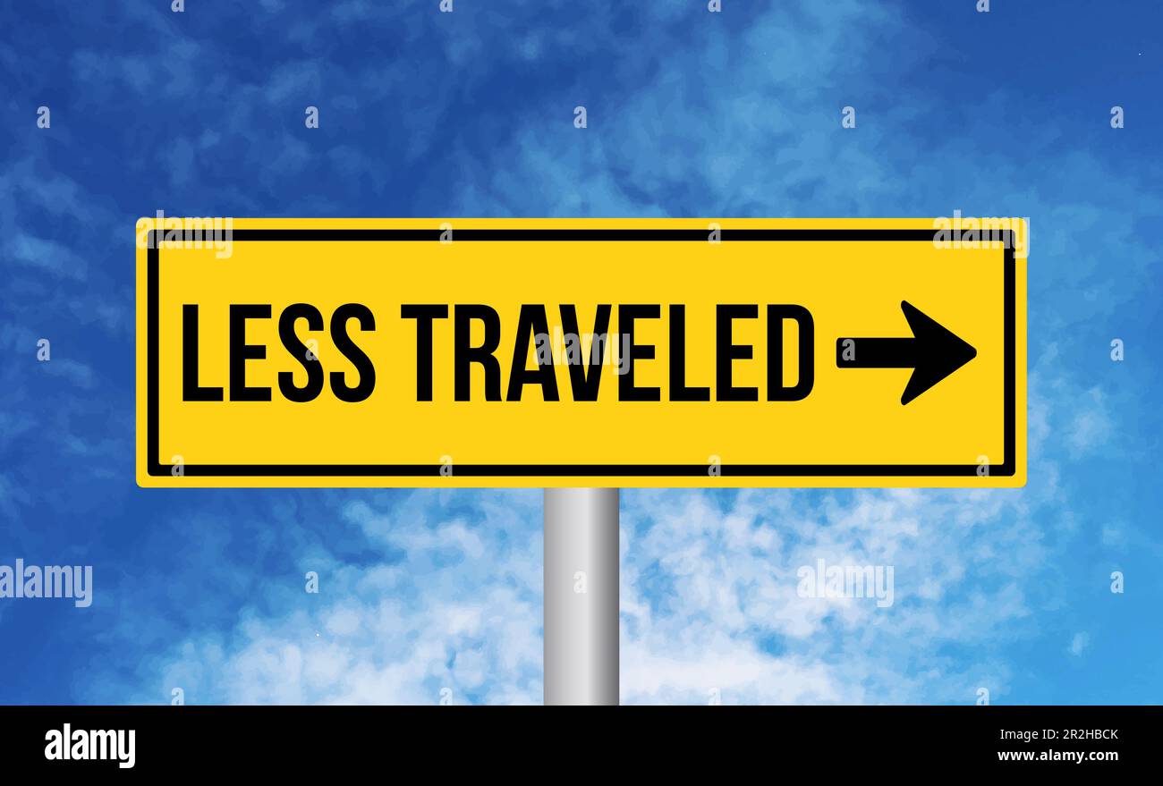 Less traveled road sign on blue sky background Stock Photo - Alamy