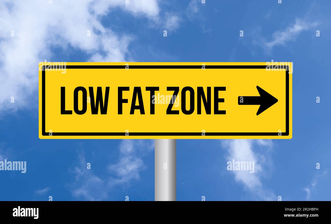 Low fat zone road sign on blue sky background Stock Photo - Alamy