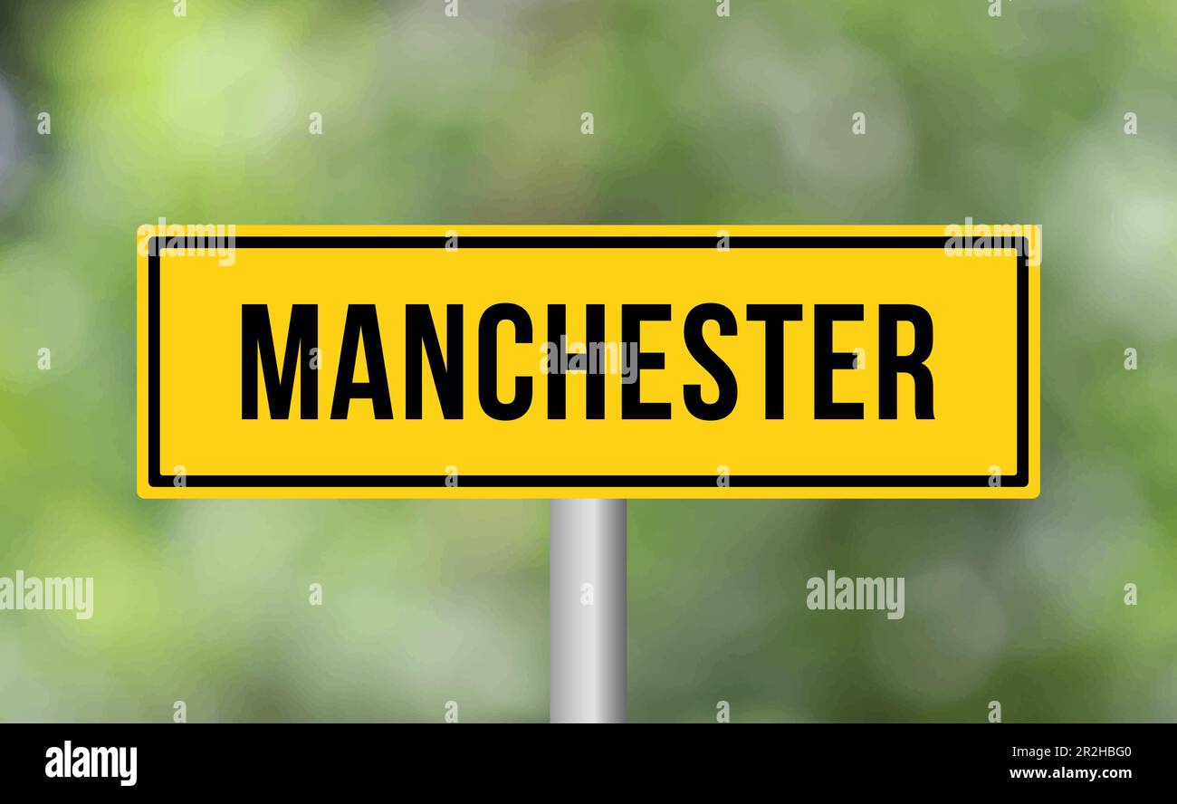 Manchester road sign on blur background Stock Photo - Alamy