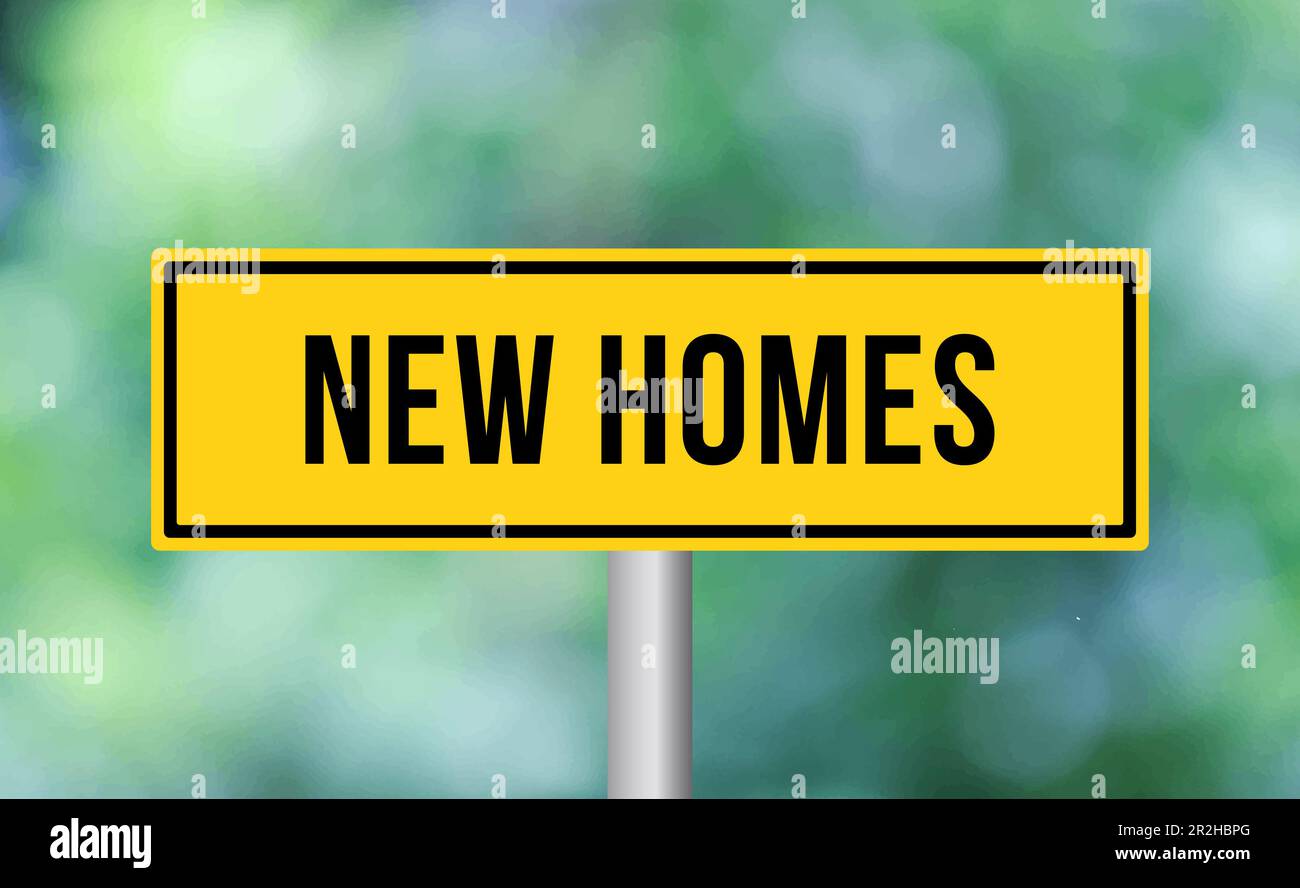 New homes road sign on blur background Stock Photo - Alamy