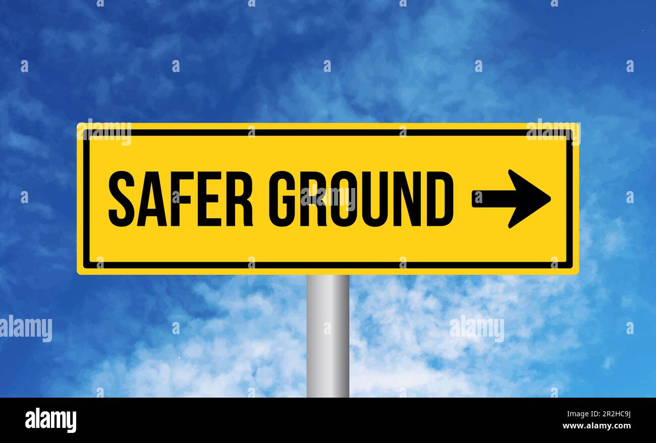Safer ground road sign on blue sky background Stock Photo - Alamy
