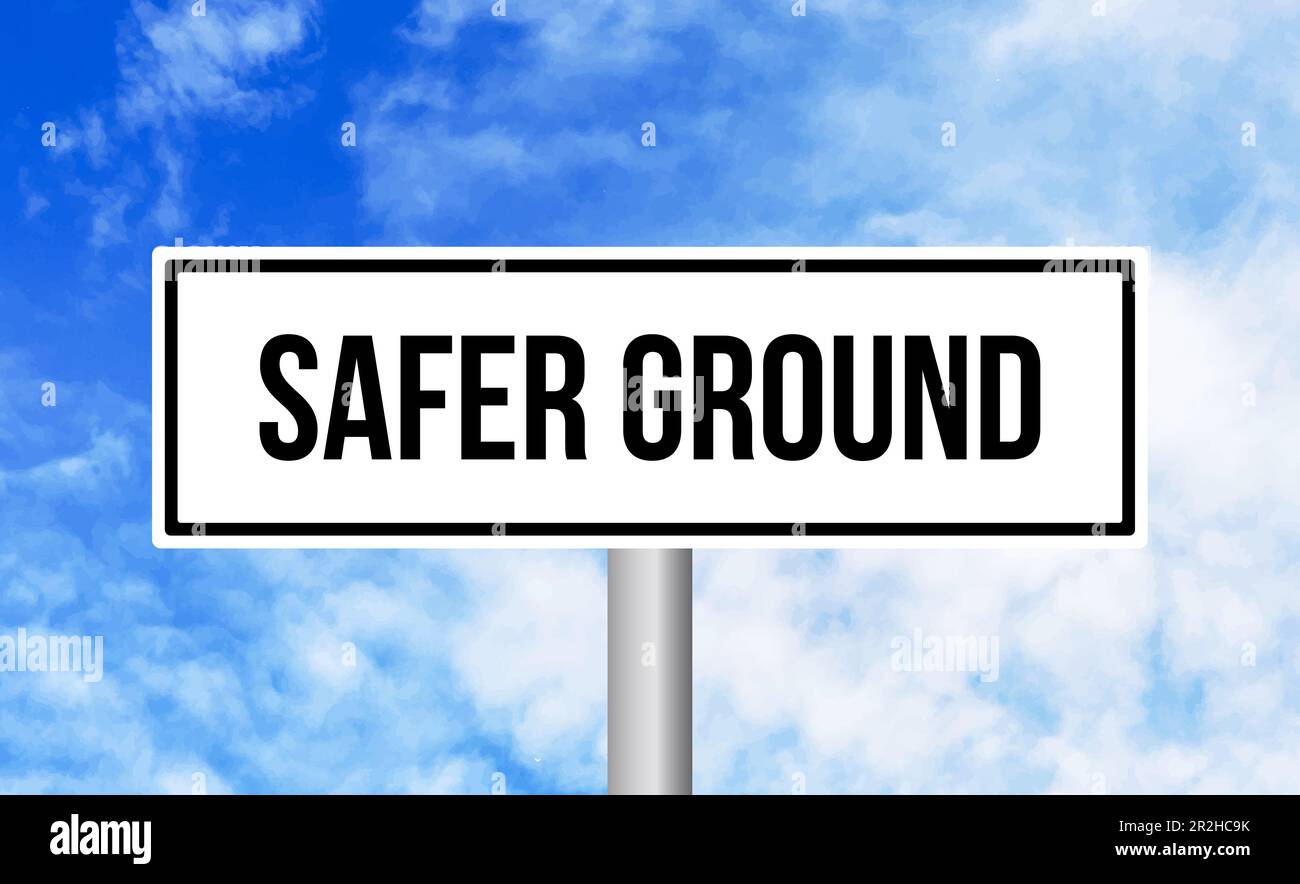 Safer ground road sign on blue sky background Stock Photo - Alamy