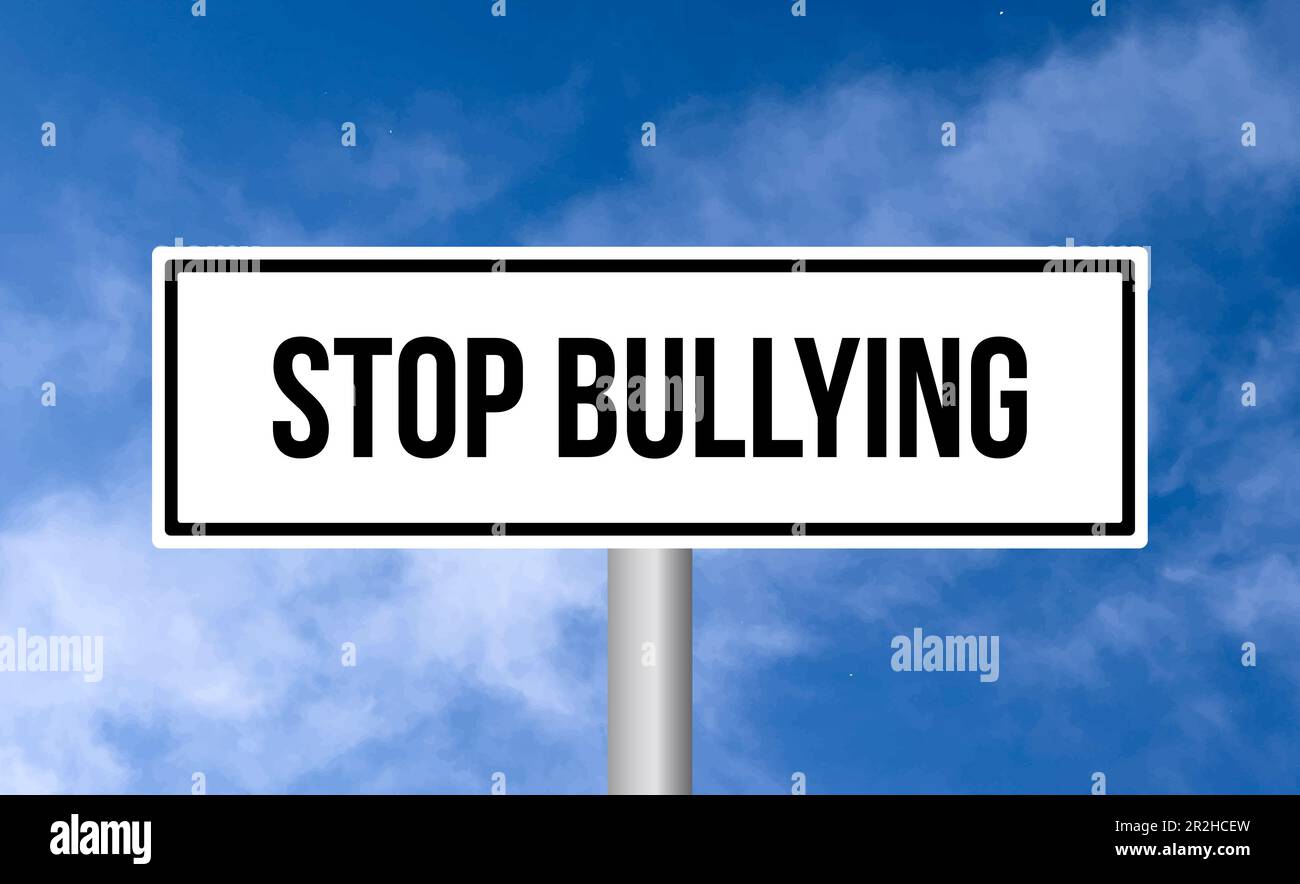 Stop bullying road sign on blue sky background Stock Photo - Alamy