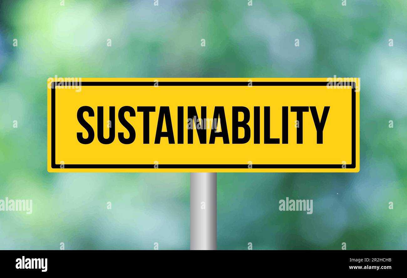 Sustainability road sign on blur background Stock Photo - Alamy