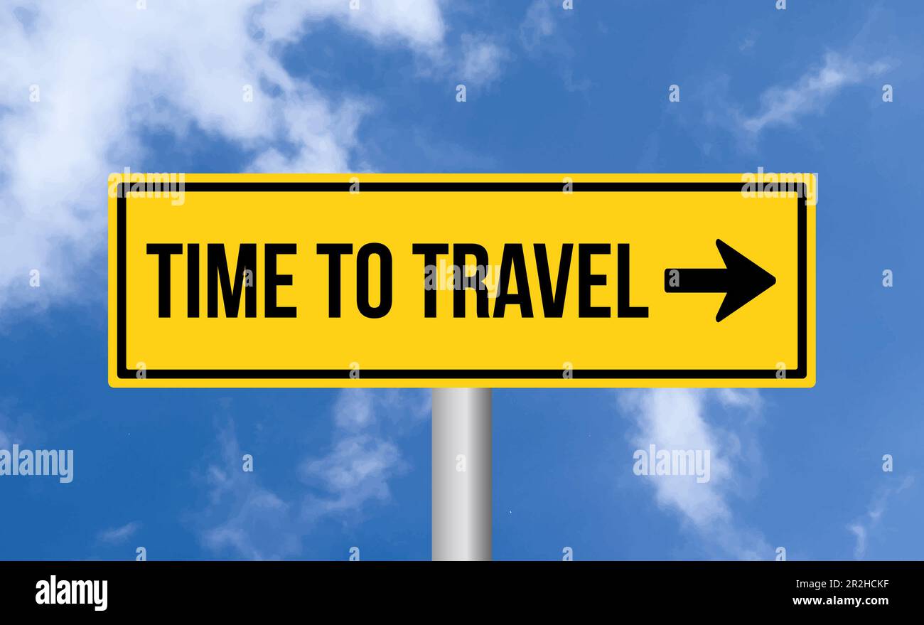Time to travel road sign on cloudy sky background Stock Photo - Alamy