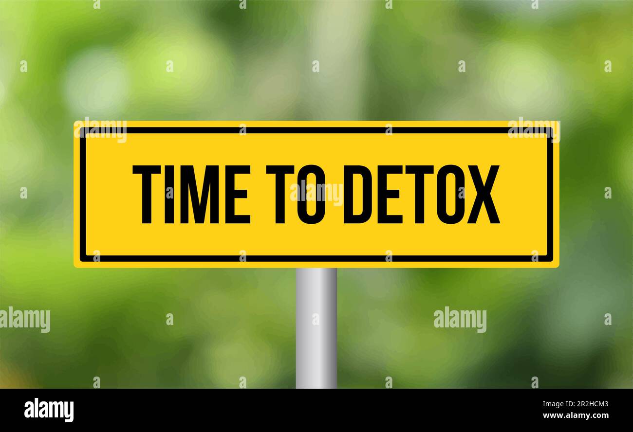 Time to detox road sign on blur background Stock Photo - Alamy