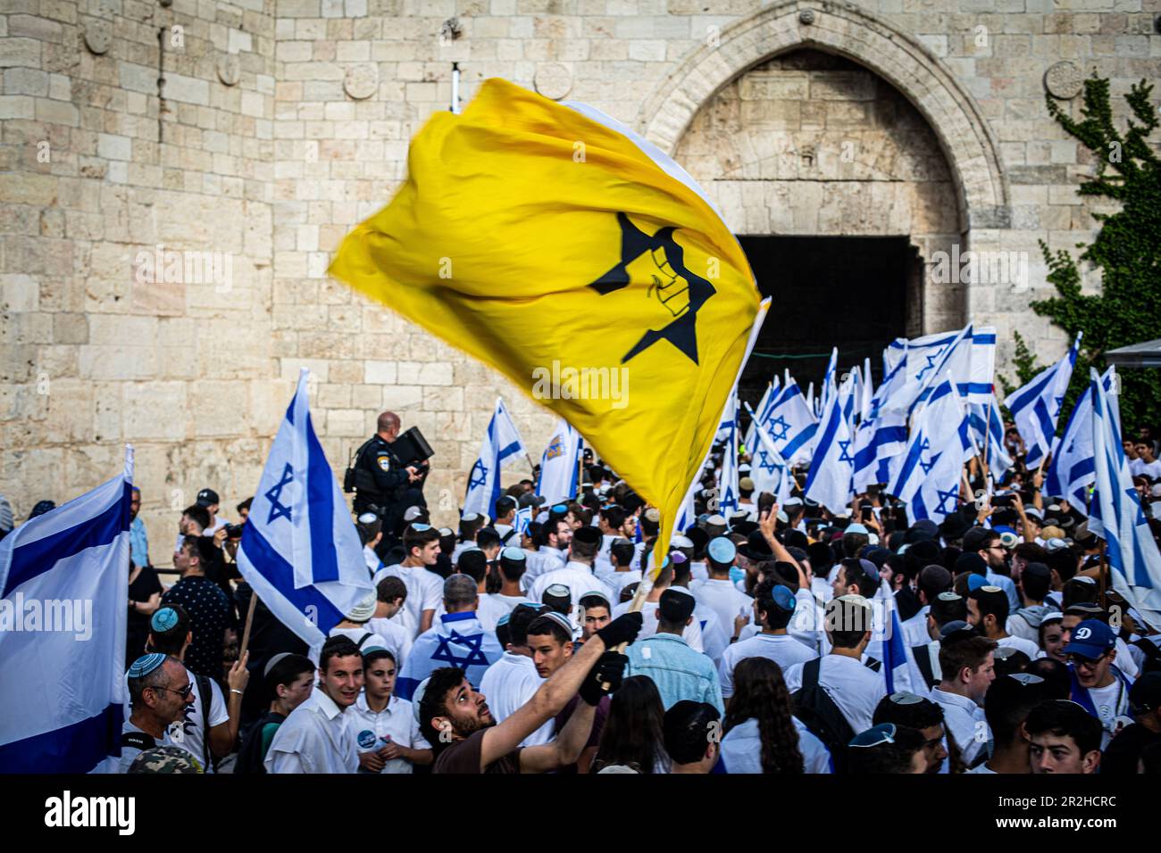 Jerusalem, Israel. 18th May, 2023. An Israeli man waves a flag of the ...