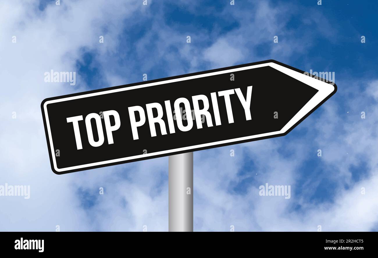 Top priority road sign on cloudy sky background Stock Photo - Alamy