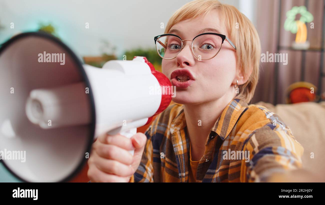 Lady using megaphone at protest hi-res stock photography and images - Alamy