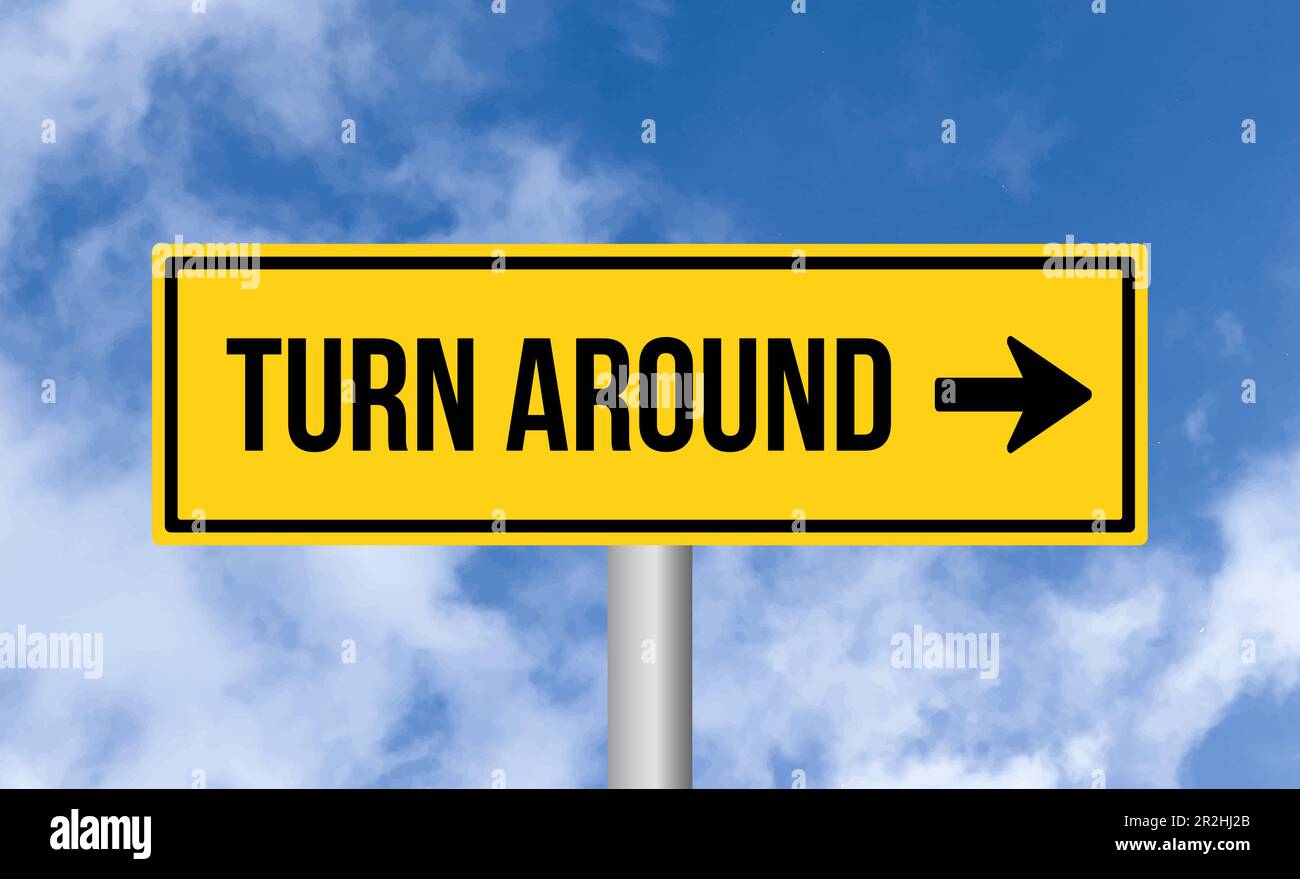 Turn around road sign on blue sky background Stock Photo - Alamy