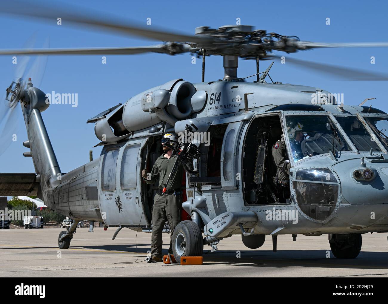 U.S. Navy Sailors, assigned to the Helicopter Sea Combat Squadron 14 ...