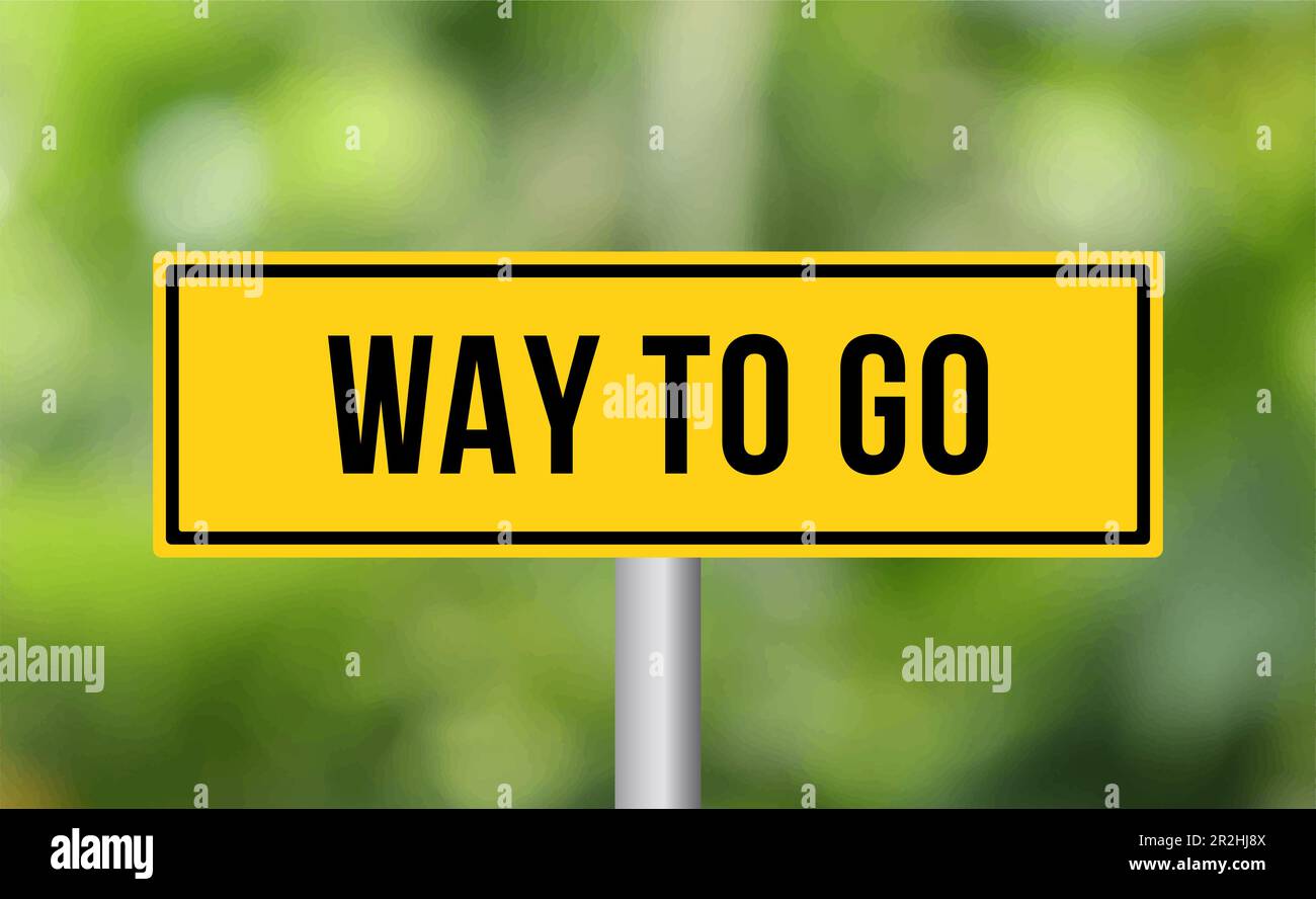 Way to go road sign on blur background Stock Photo - Alamy