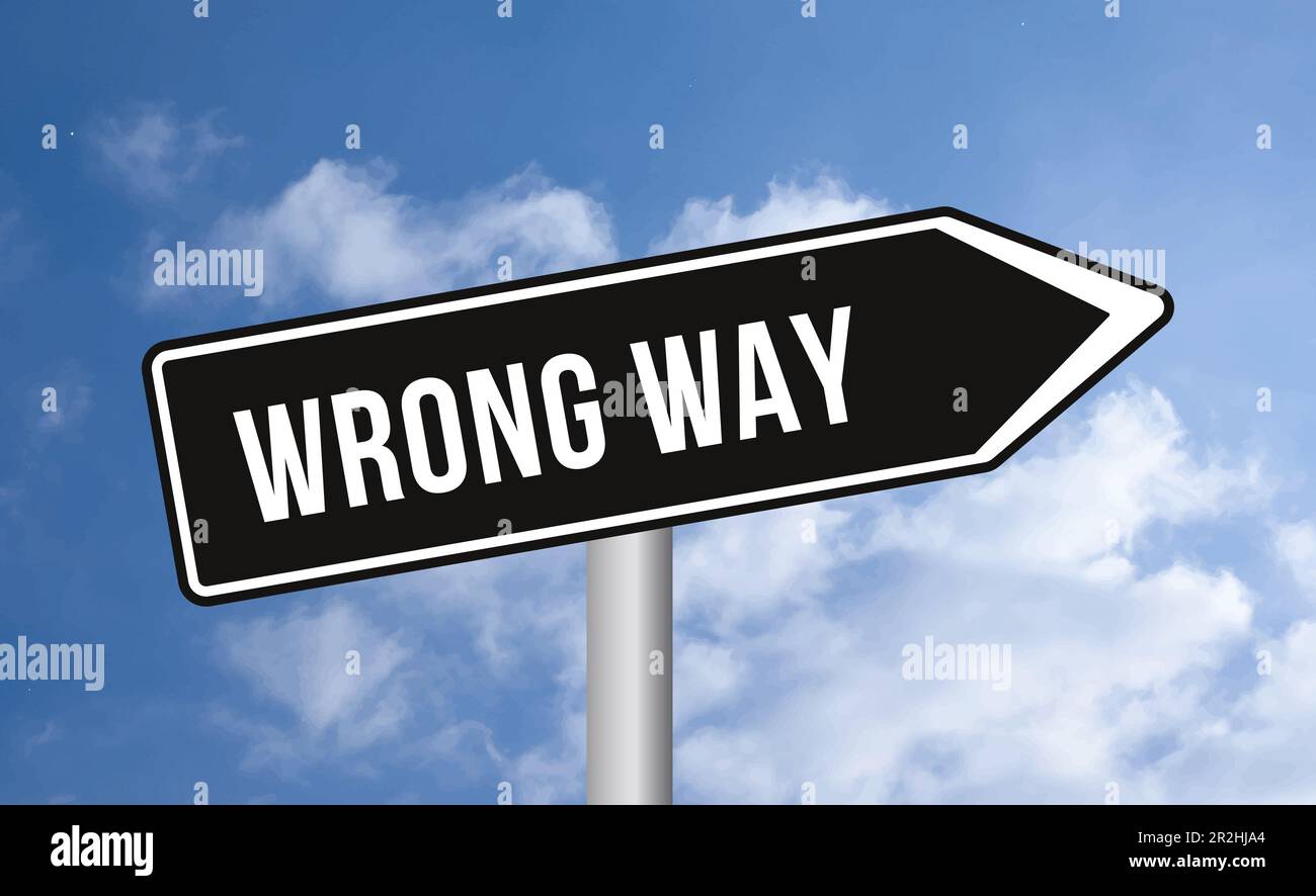 Wrong way road sign on sky background Stock Photo - Alamy