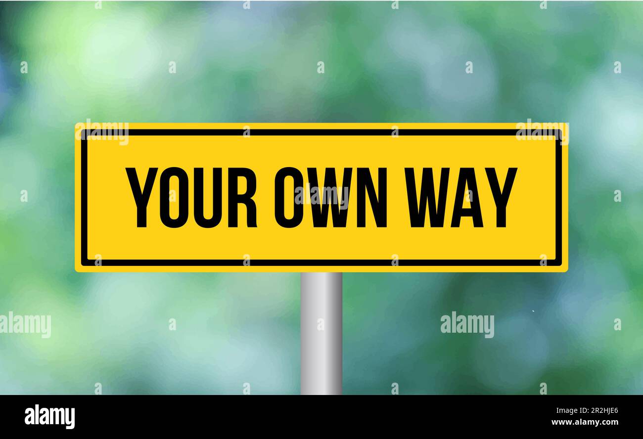 Your own way road sign on blur background Stock Photo - Alamy