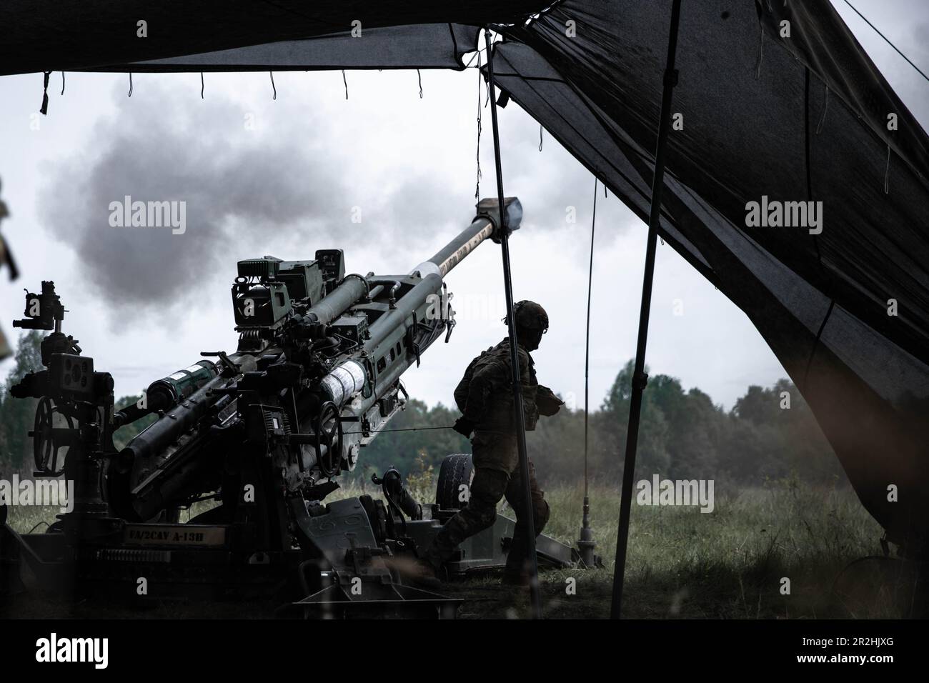 U.S. Army Spc. Brady Cinotto, an assistant gunner assigned to the 1st ...