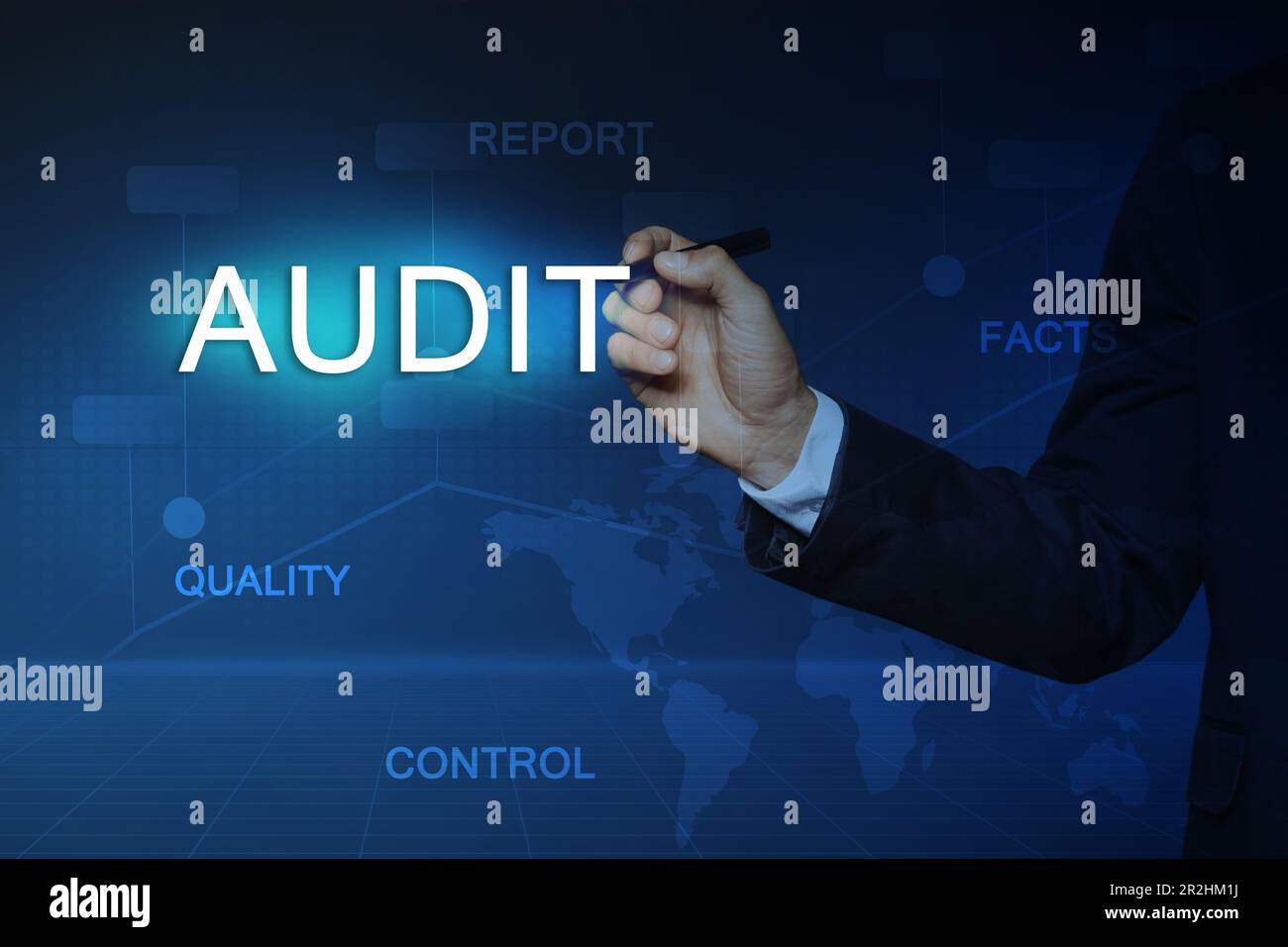Audit concept. Businessman with pen, words, scheme and world map ...