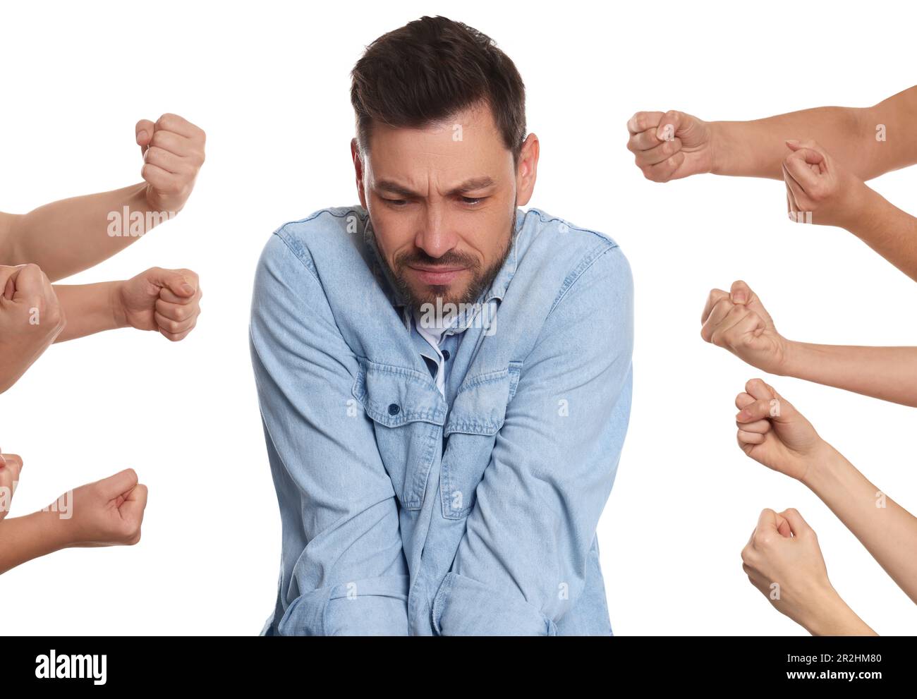 People bullying scared man on white background Stock Photo - Alamy