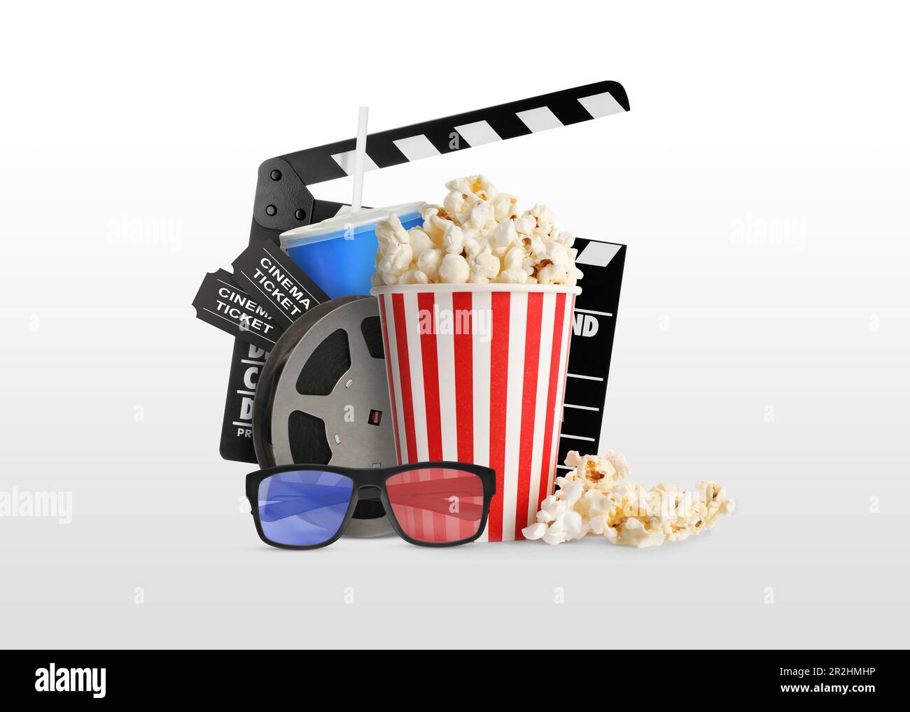 Movie clapper, drink, pop corn, 3D glasses and film reel on white ...