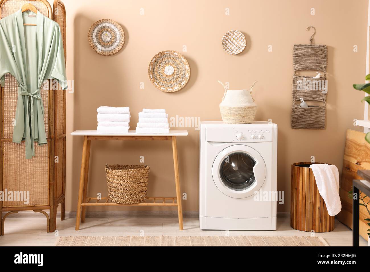 Stylish laundry room with modern washing machine. Interior design Stock ...