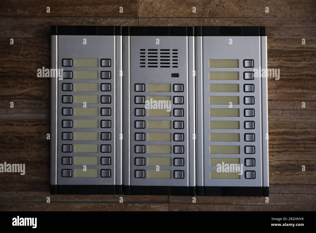 Modern intercom system on stone wall. House security Stock Photo - Alamy