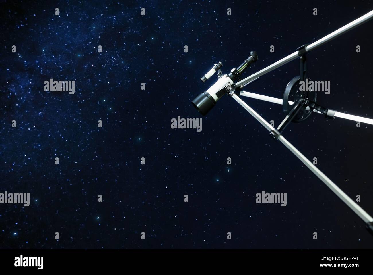 Modern telescope and beautiful sky with stars in night outdoors, low ...