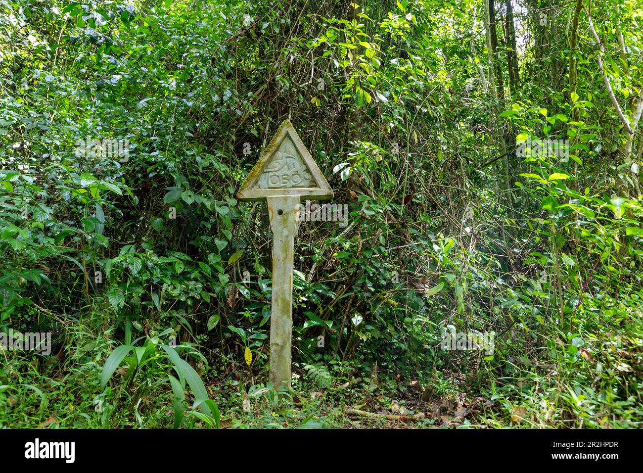 Marker sign of the Obô Natural Park on the island of São Tomé in West ...