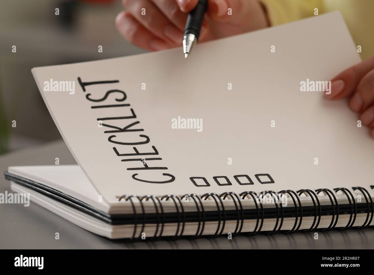 Woman filling checklist table hi-res stock photography and images - Alamy