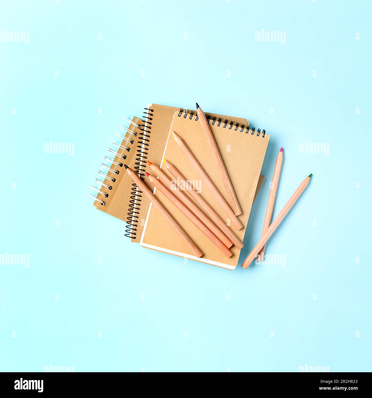 Different school stationery on light blue background, flat lay. Back to ...