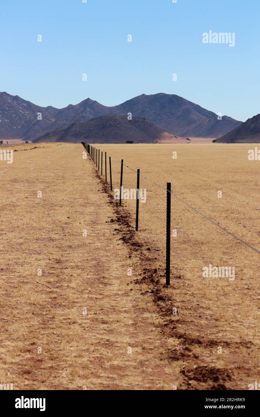 Namibia; Southern Namibia; Hardap region; Namib Desert; Electric fence ...