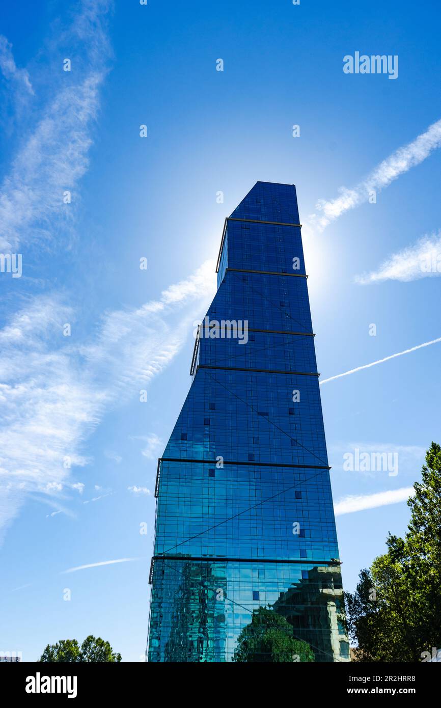 Glass skyscraper in Tbilisi's downtown on the blue sky background Stock ...