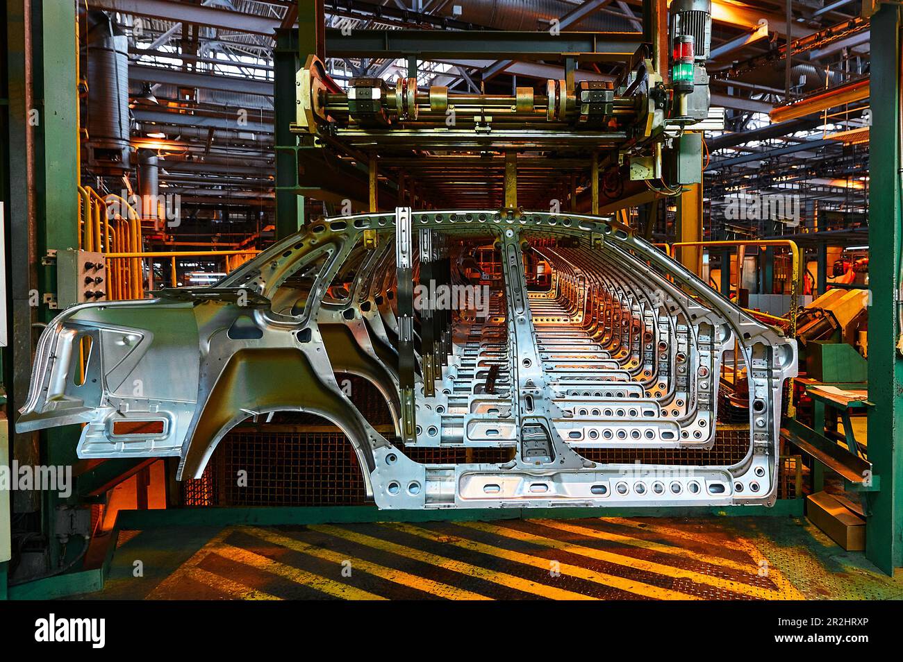 Details of car carcass hang on assembling conveyor Stock Photo - Alamy