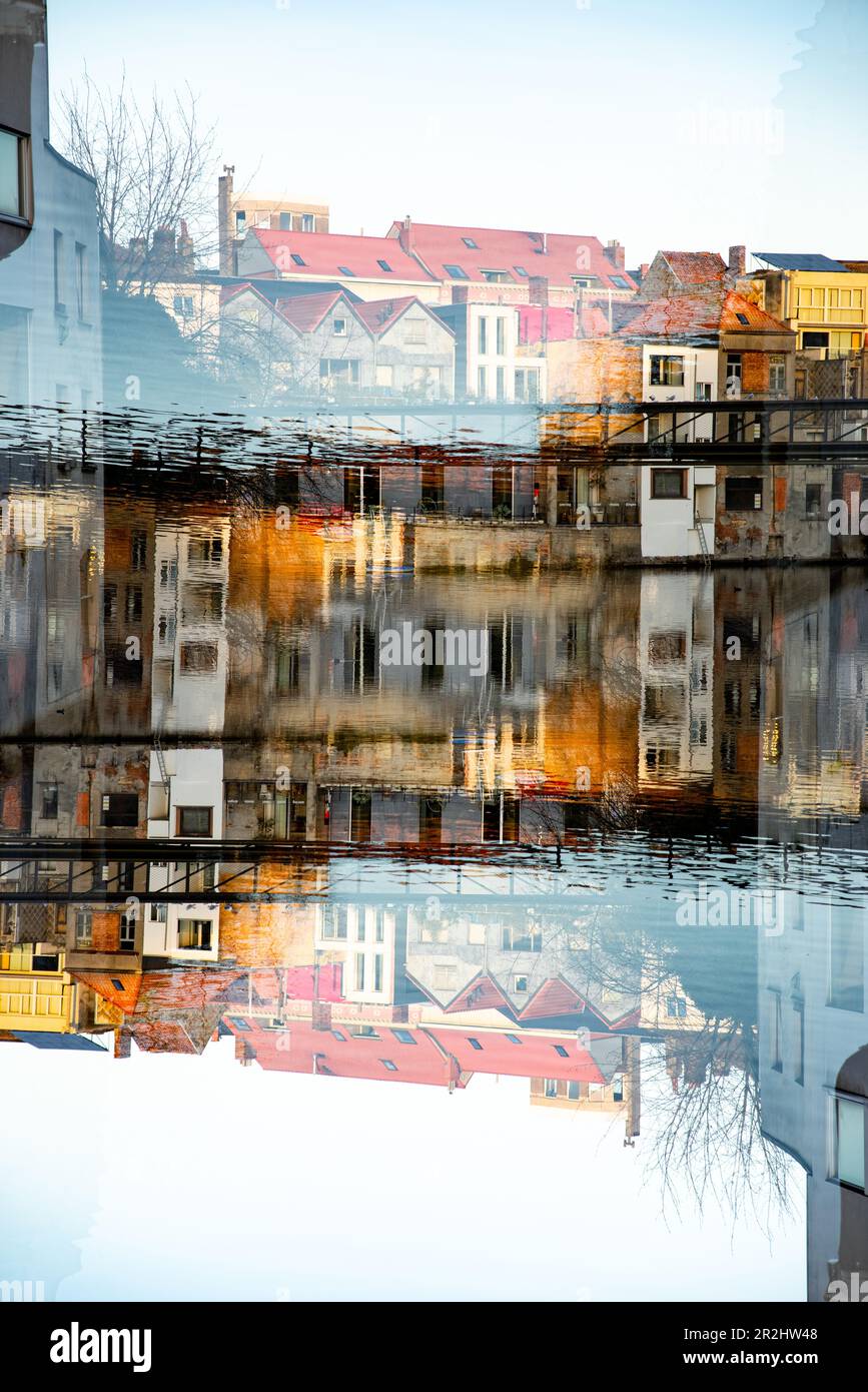 Double exposure photo of buildings reflected in water in Gent, Belgium ...