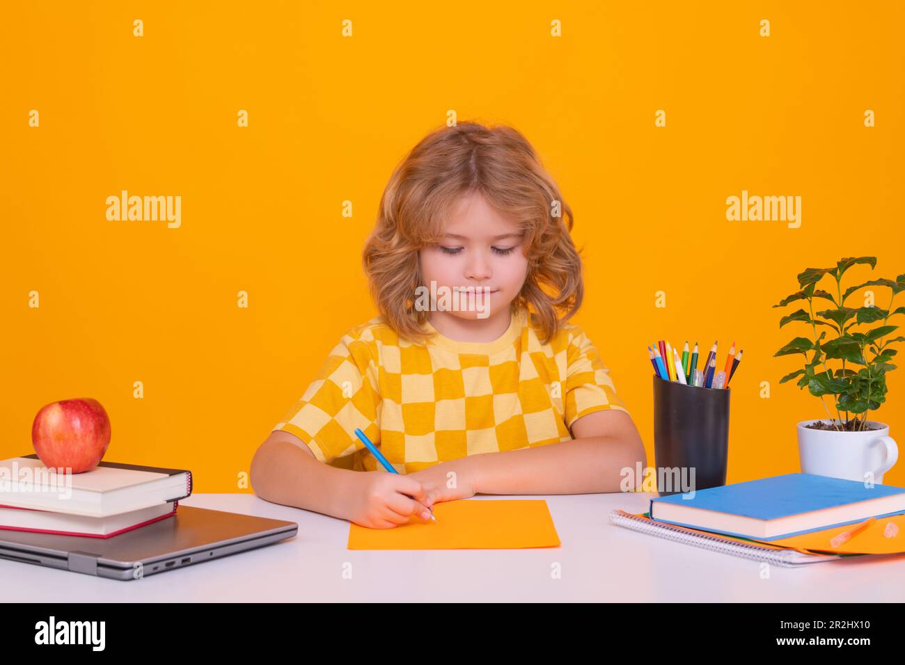 School child 7-8 years old with book go back to school. Little student ...
