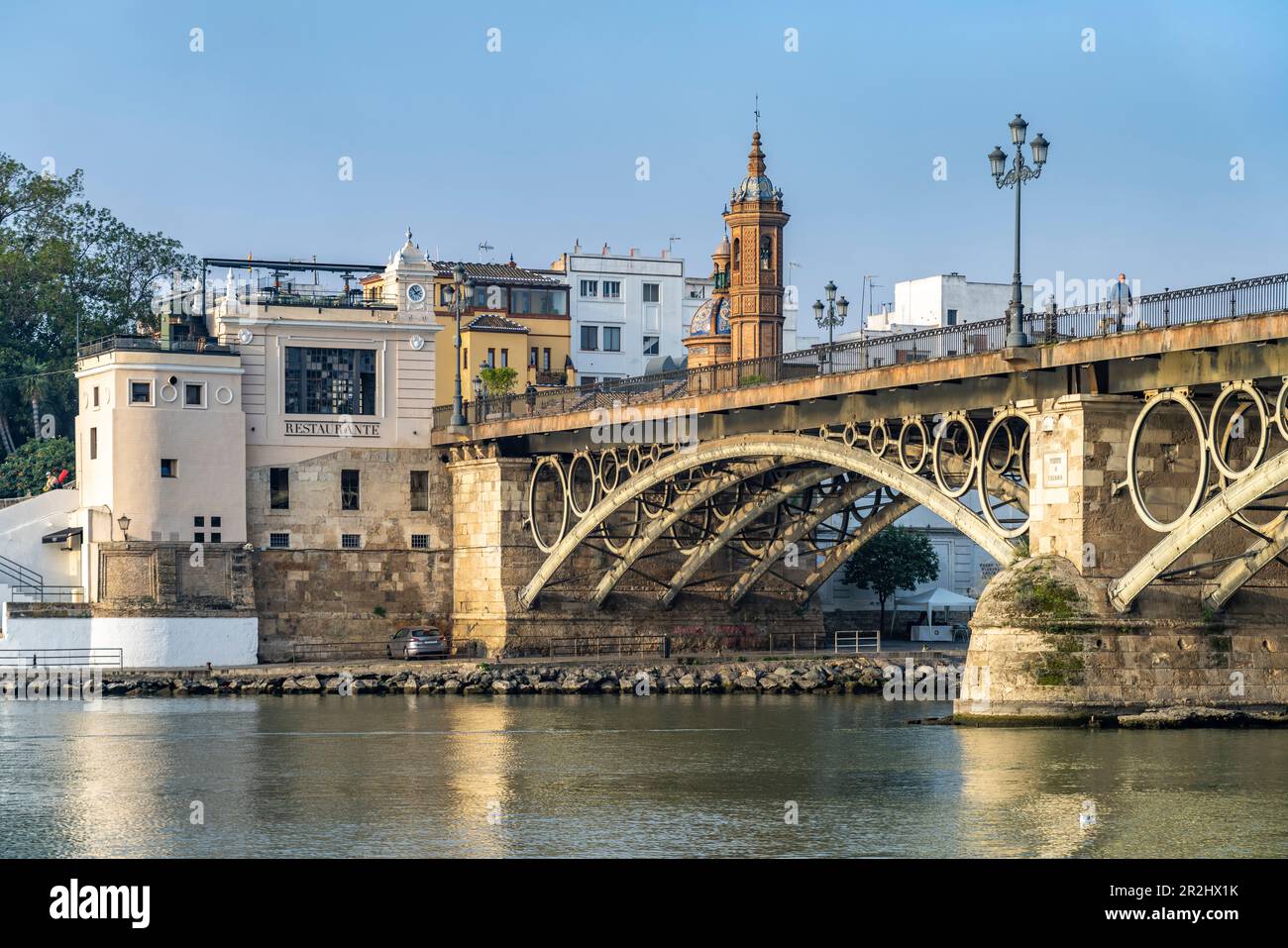 Puente de Isabel II Bridge over the Guadalquivir River and the Capilla ...