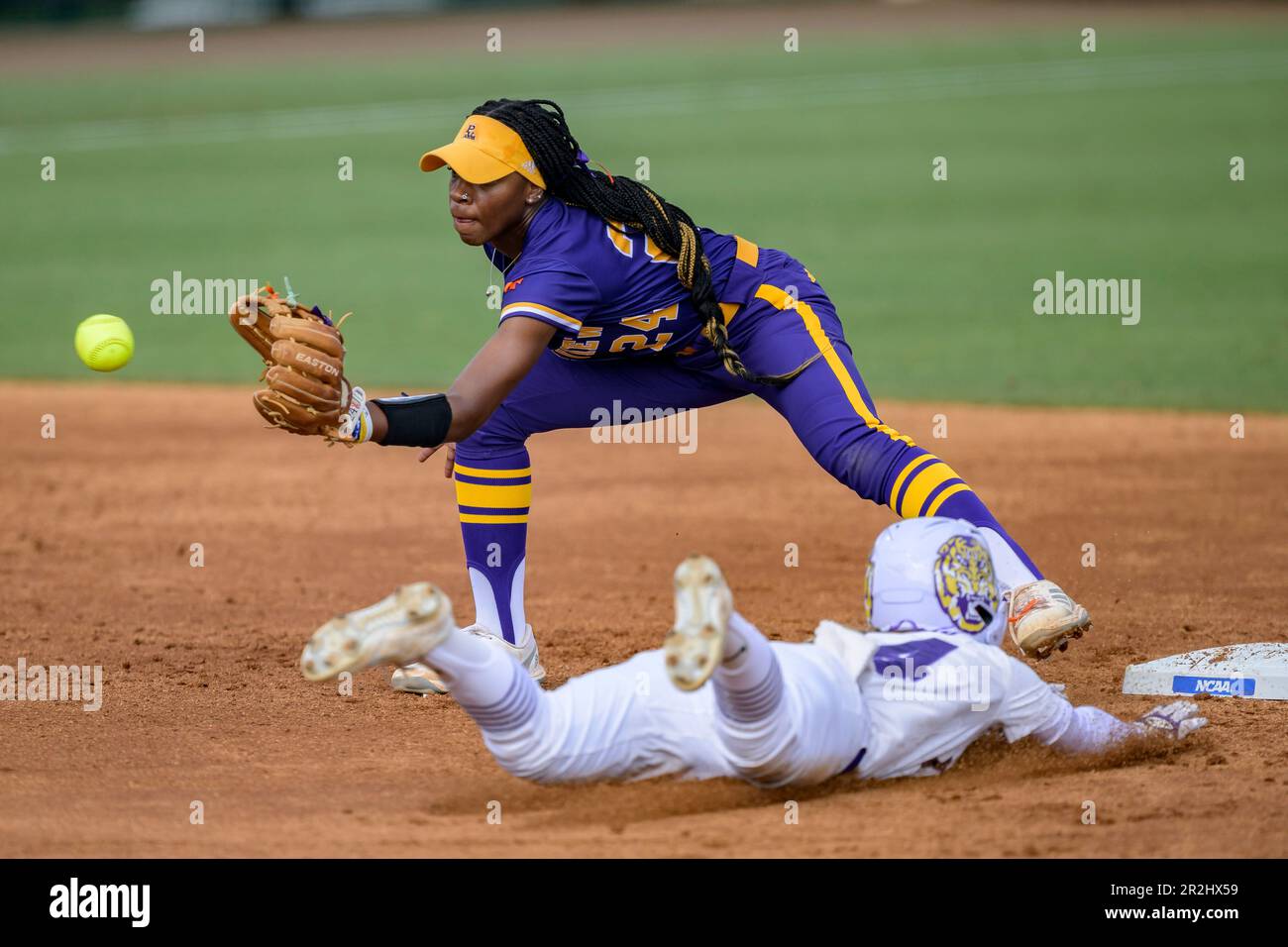 LSU outfielder Ali Newland (44) slides safely into second base as she ...