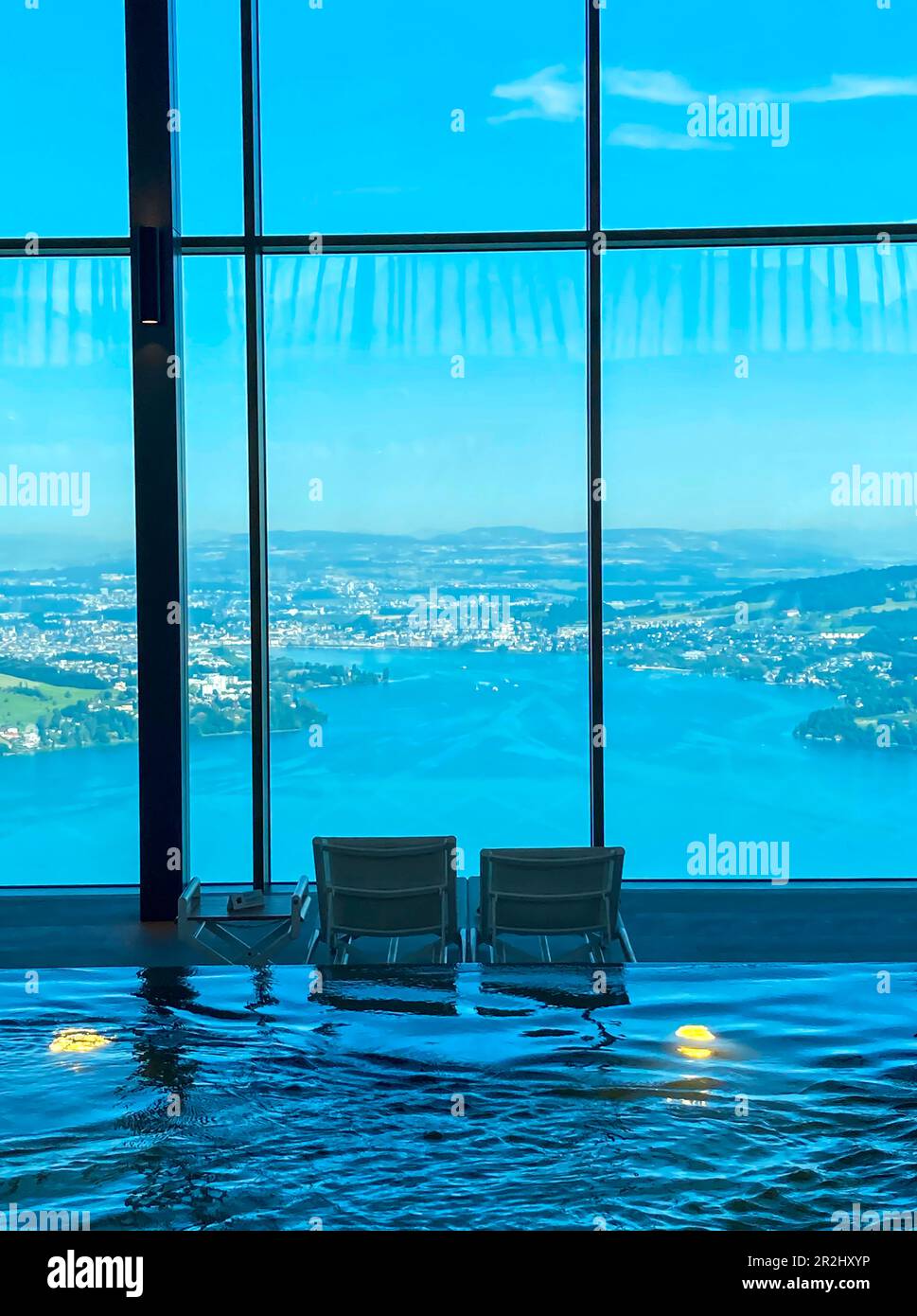 Infinity Swimming Pool with Mountain and Lake Lucerne View in a Sunny ...