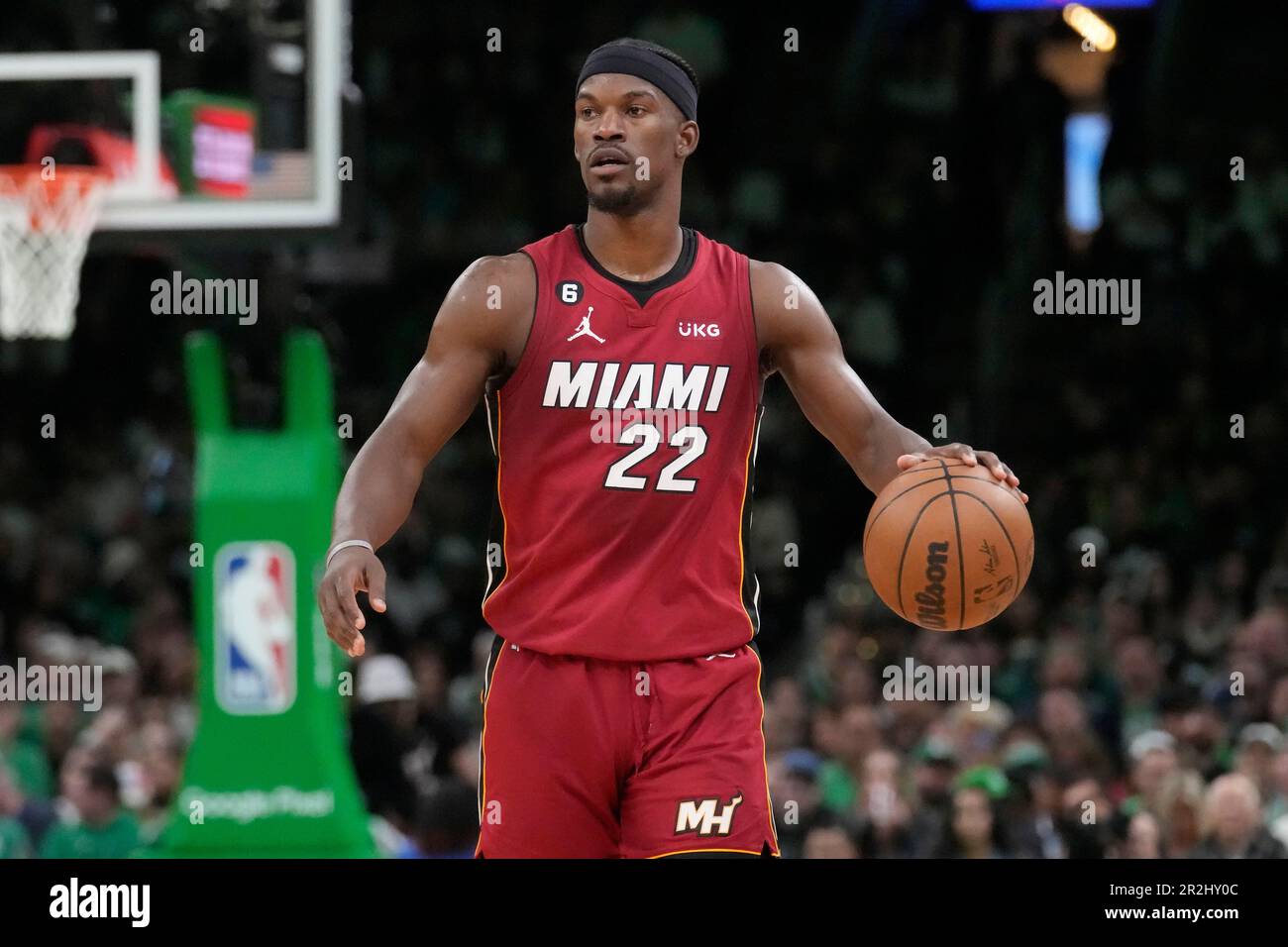 Miami Heat forward Jimmy Butler (22) brings the ball up the court ...
