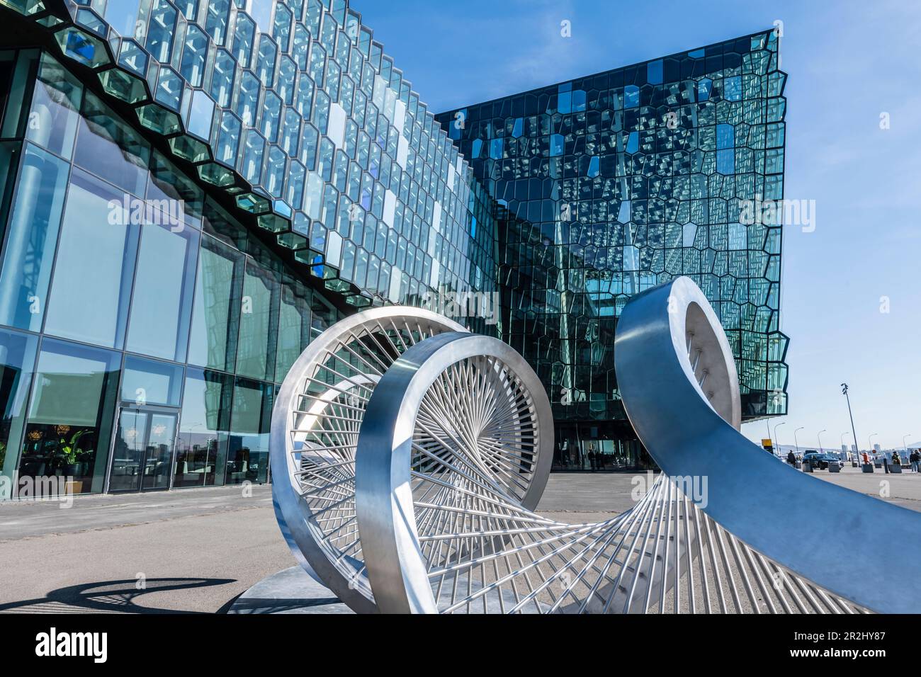 Art object in front of the glass facade, Harpa Concert Hall, Reykjavik ...