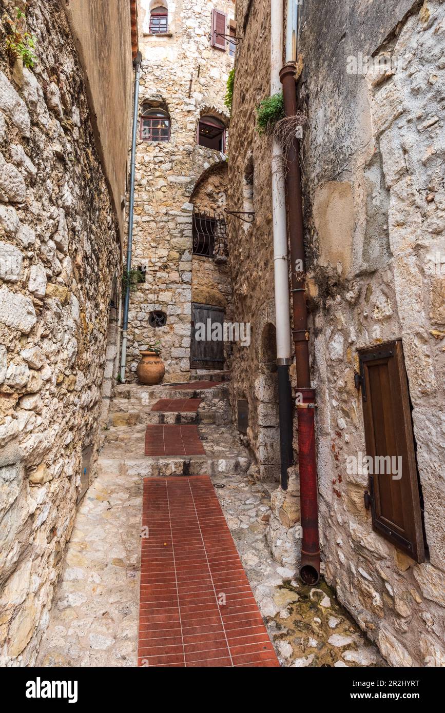 Alley in the mountain village of Èze Village in the French Maritime ...