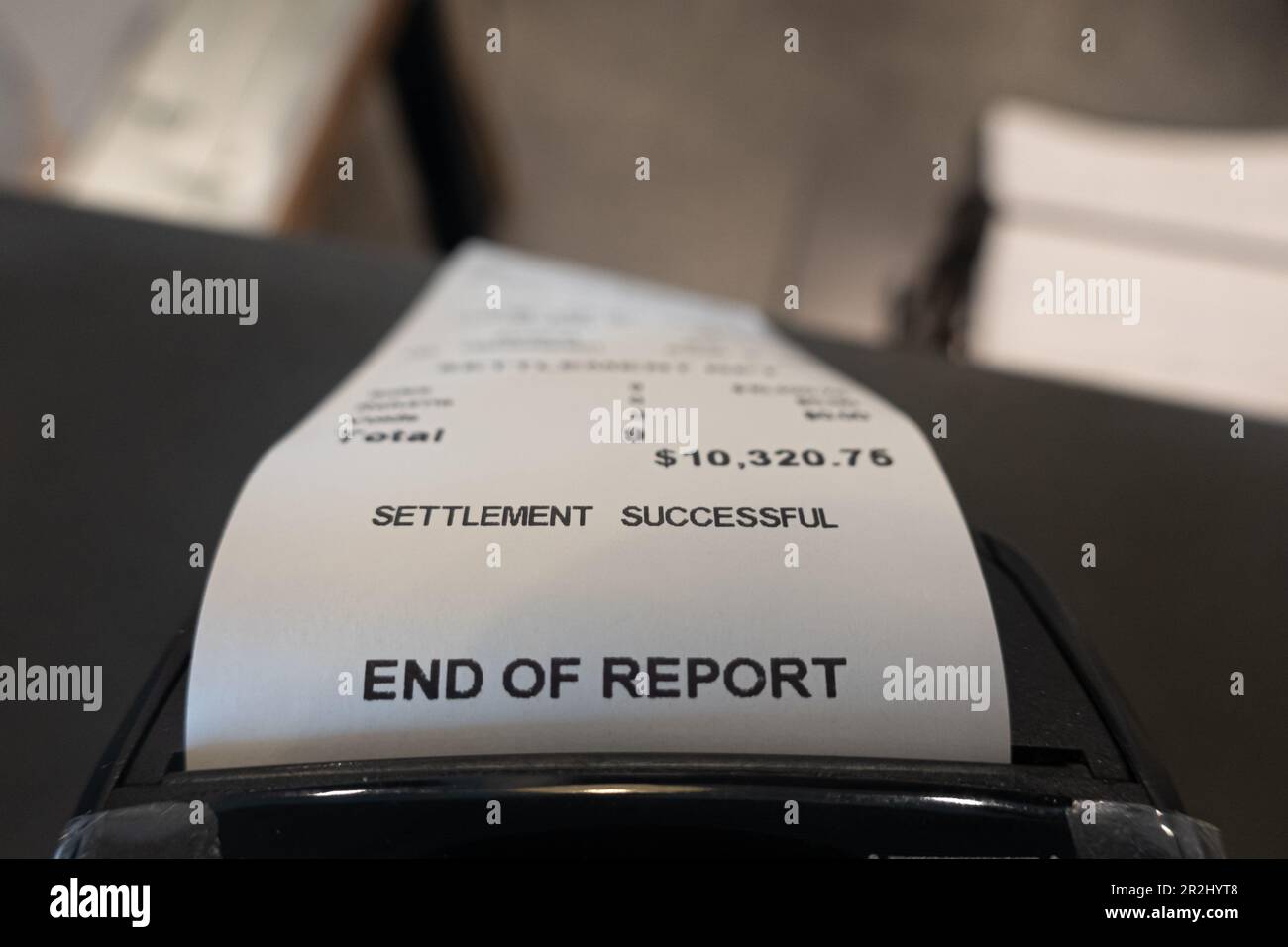 Credit card machine roll at end of day showing collections Stock Photo ...