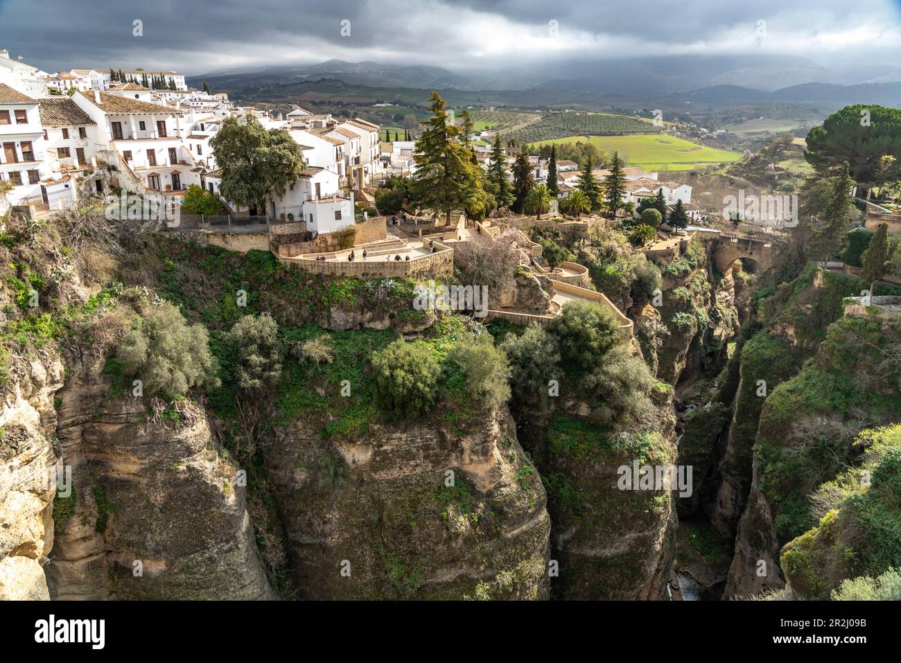 Tajo de Ronda gorge and the white houses of La Ciudad old town, Ronda ...