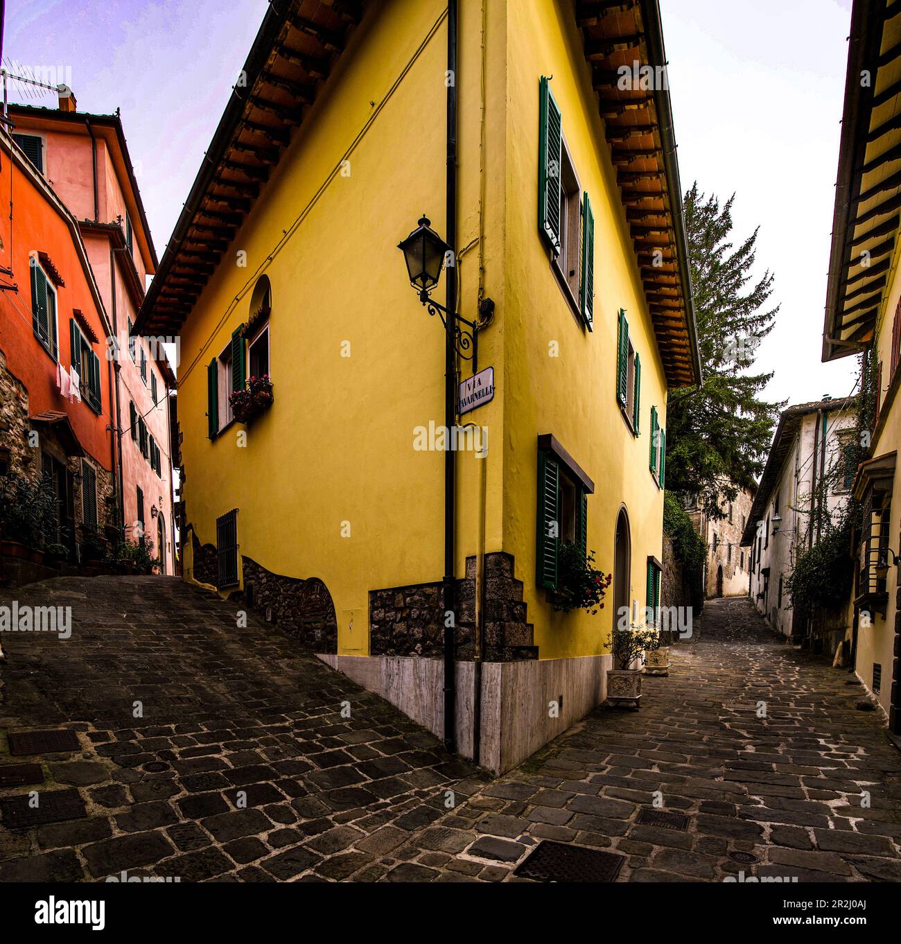 Historical buildings in the alleys of the mountain village of ...