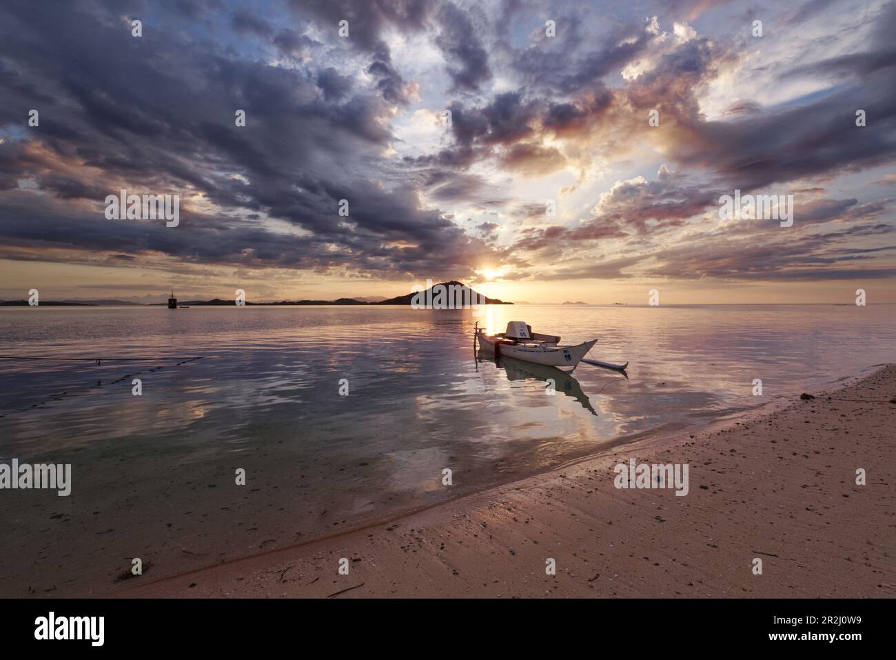 Sunset on Kanawa, Komodo National Park, Indonesia Stock Photo - Alamy