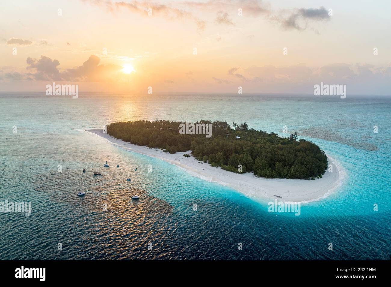 Tropical island washed by the crystal water of the exotic lagoon at ...