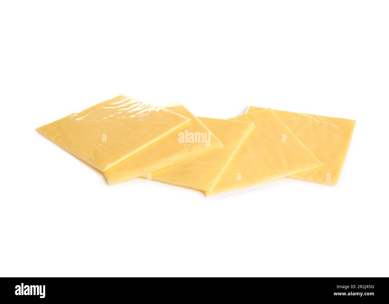 Slices of tasty processed cheese on white background Stock Photo - Alamy
