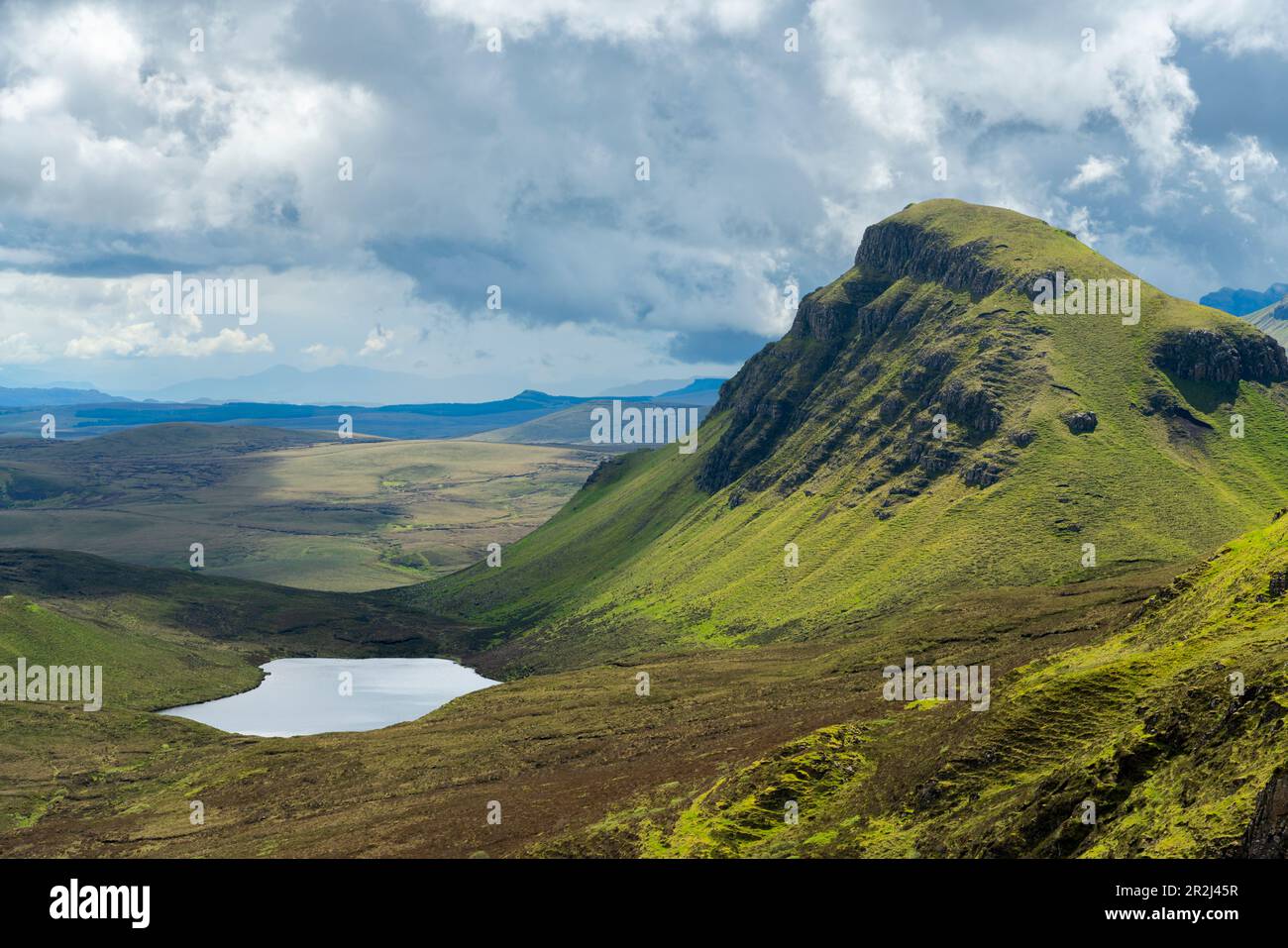 Cleat Rock and Loch Cleat at sunset, Quiraing, Trotternish, Isle of ...